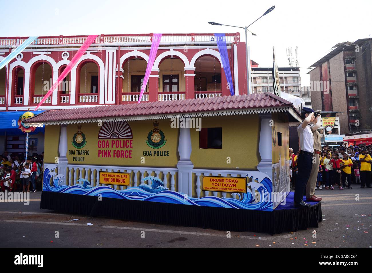 Goa police float in foreground of Old Goan architecture displaying a ...