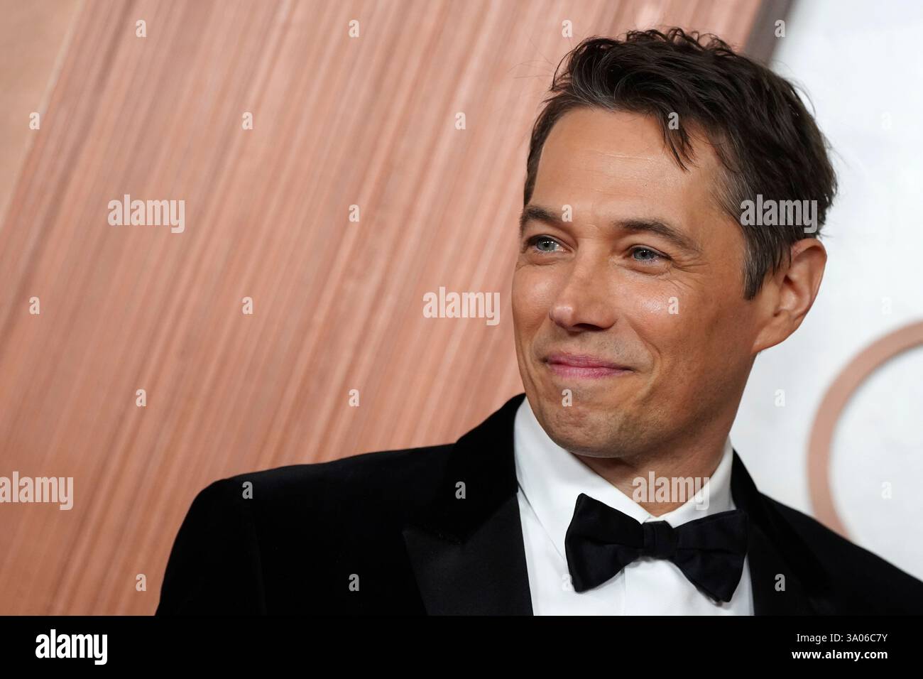 Sean Baker arrives at the Oscars on Sunday, March 2, 2025, at the Dolby ...