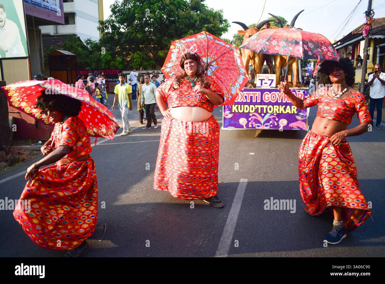 Men dressed as women dance on the beat in Goan traditional attire in ...