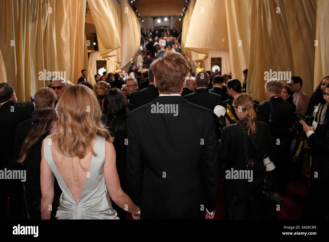 Liza Powel O'Brien, left, and Conan O'Brien arrive at the Oscars on ...