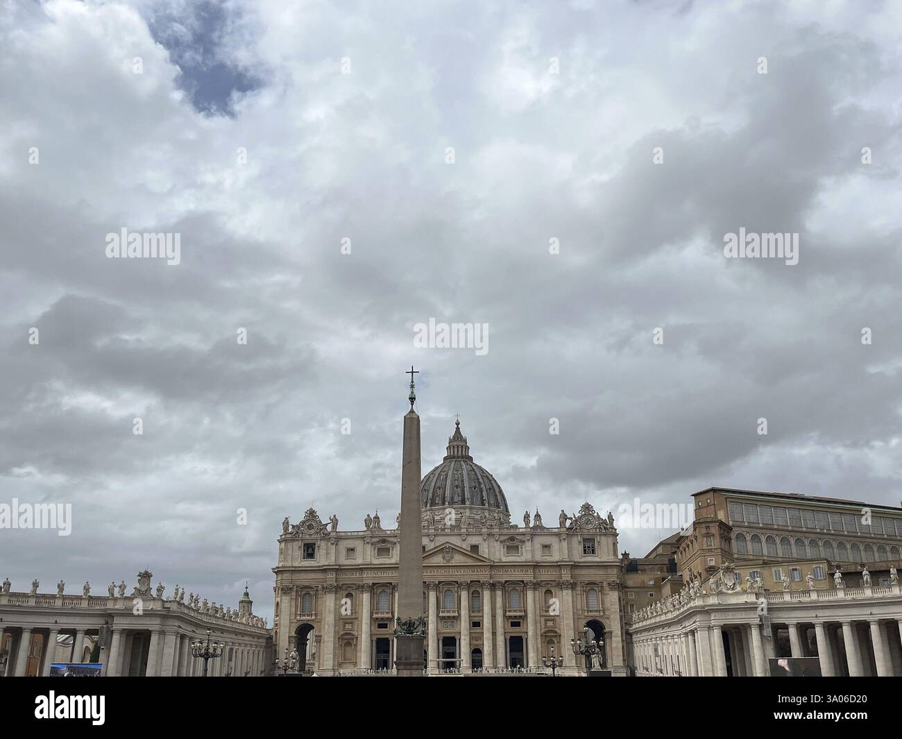 Religious building with dome and obelisk under a cloudy sky, Rome ...
