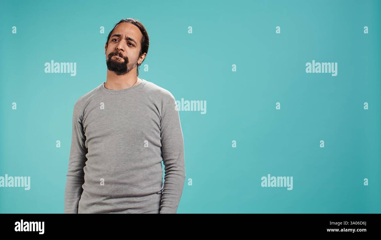 Man shaking fist in excitement while cheering for favorite sports team ...