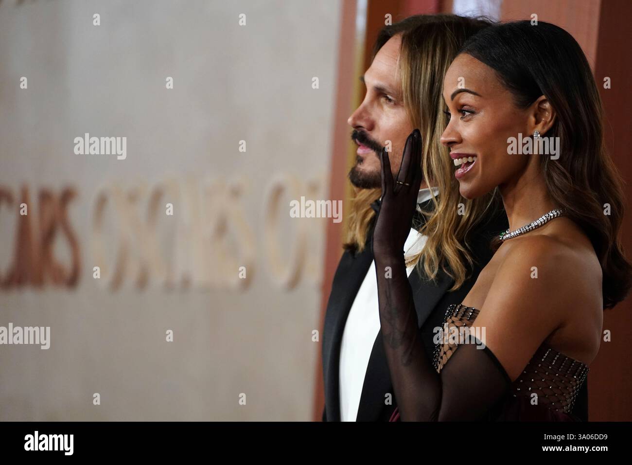 Marco Perego-Saldana, left, and Zoe Saldana arrive at the Oscars on ...