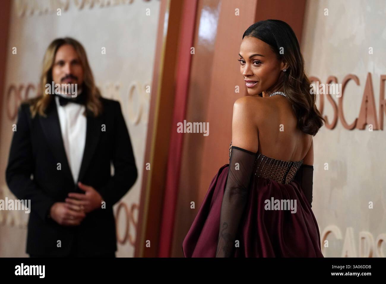 Marco Perego-Saldana, left, and Zoe Saldana arrive at the Oscars on ...