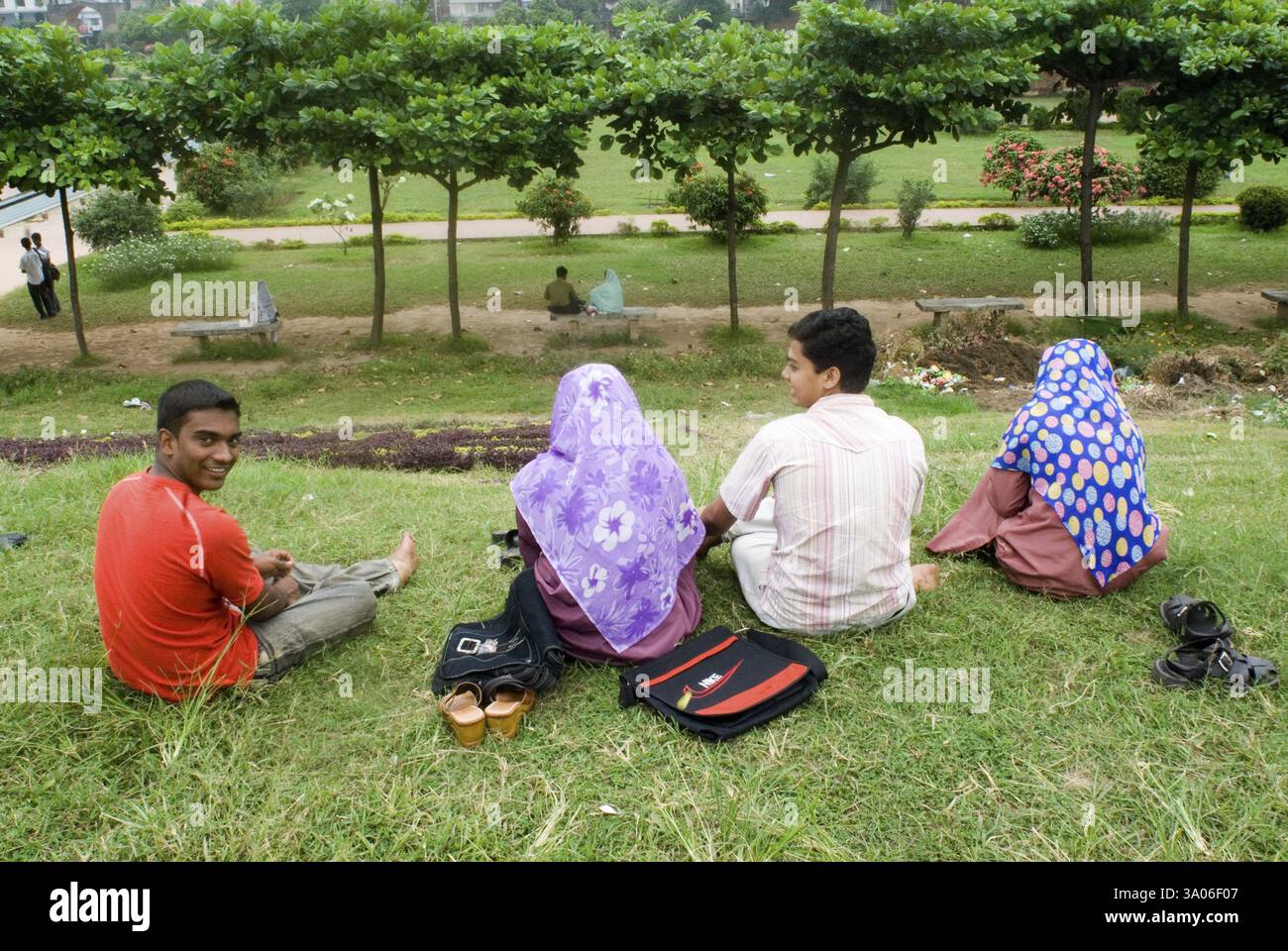 Tourists Sitting on Lawn of Lalbagh fort built by prince Muhammad Azam ...