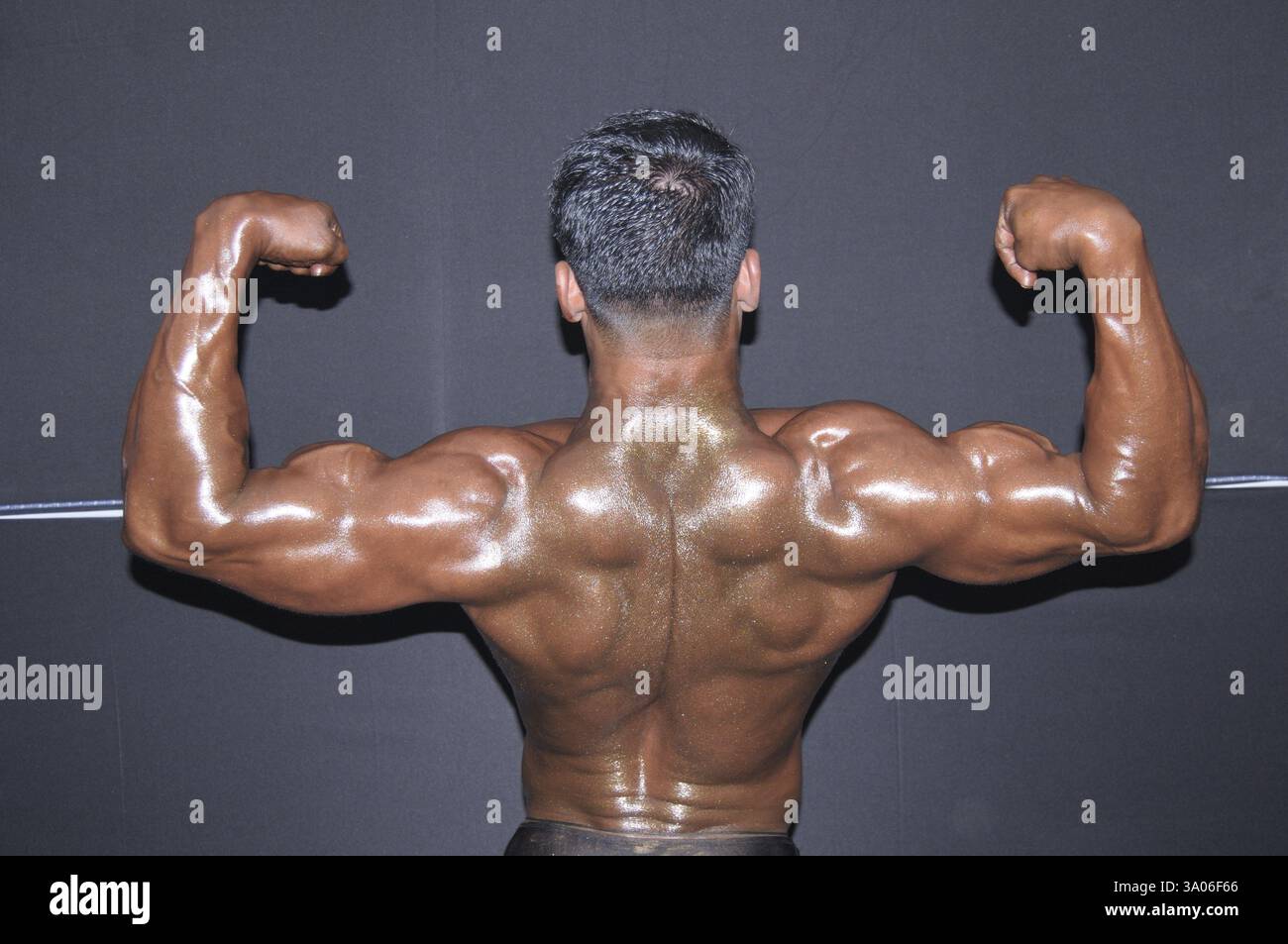 Body builder showing muscles in recent marathon, Bombay Mumbai ...
