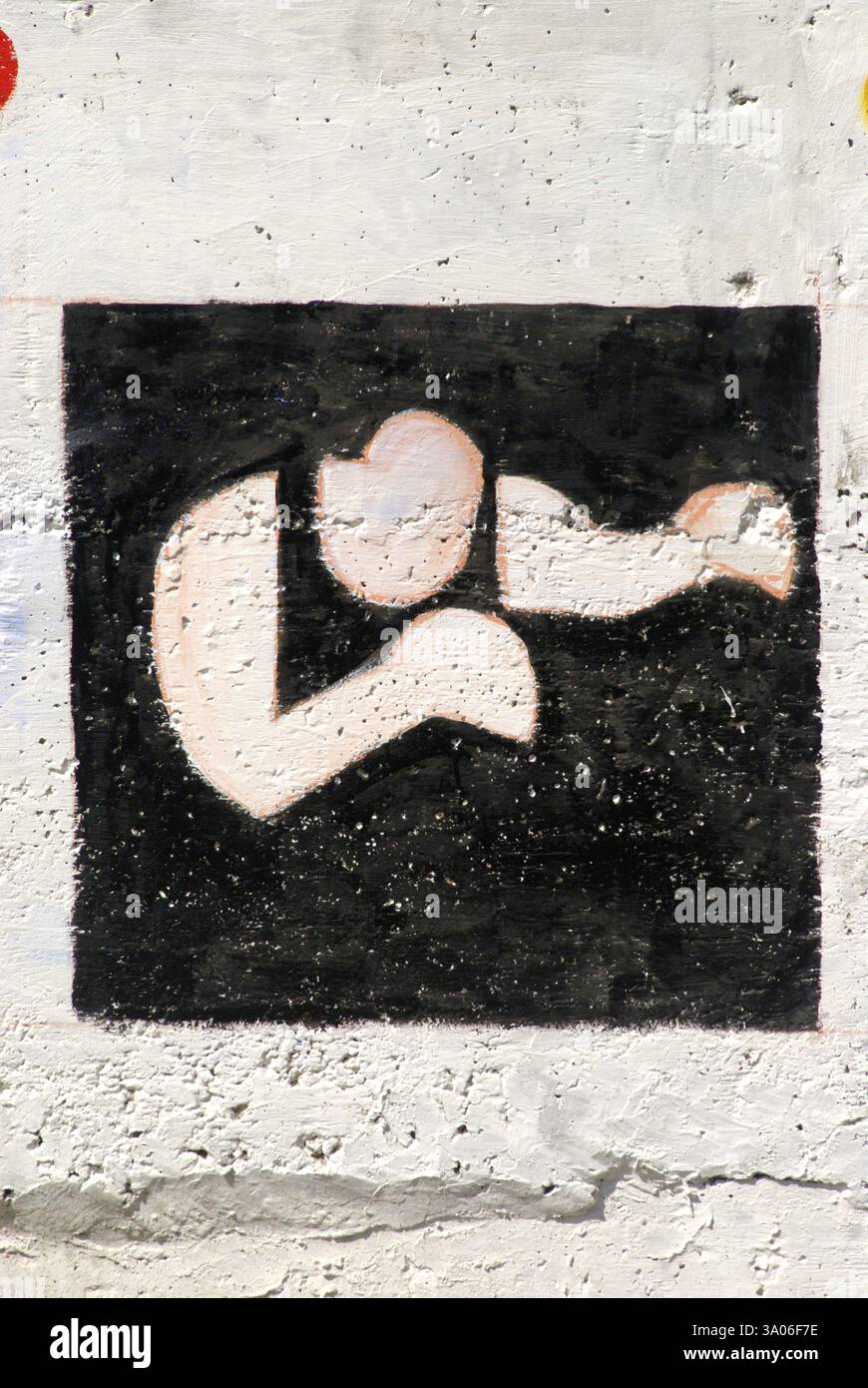 Boxing the pictogram of III Commonwealth Youth Game painted on wall of ...