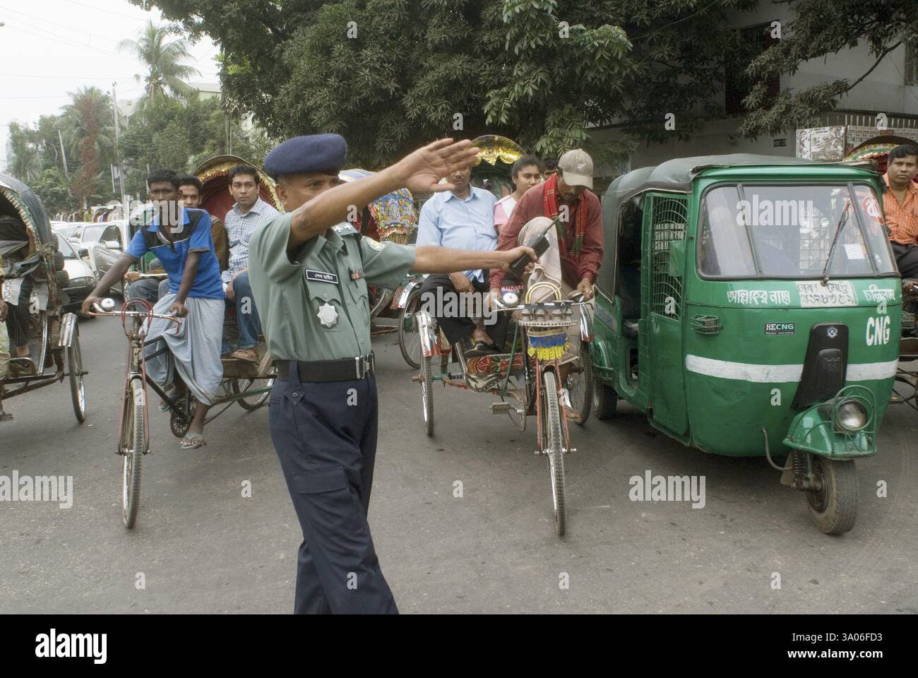 Traffic police Showing Direction and controlling Traffic on street, Dhaka, Bangladesh, Asia ...