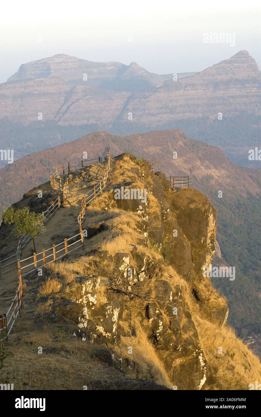 Takmak tok in morning light and Sahyadri mountains range at fort Raigad ...