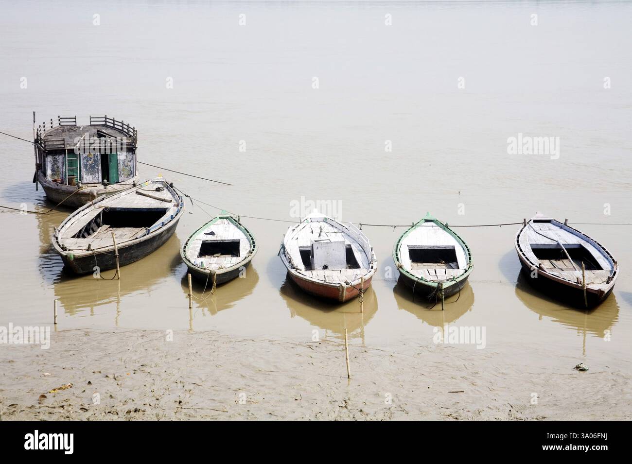 Six Boats tied on the bank, Ganga Ganges river, Assi Ghat, Varanasi ...