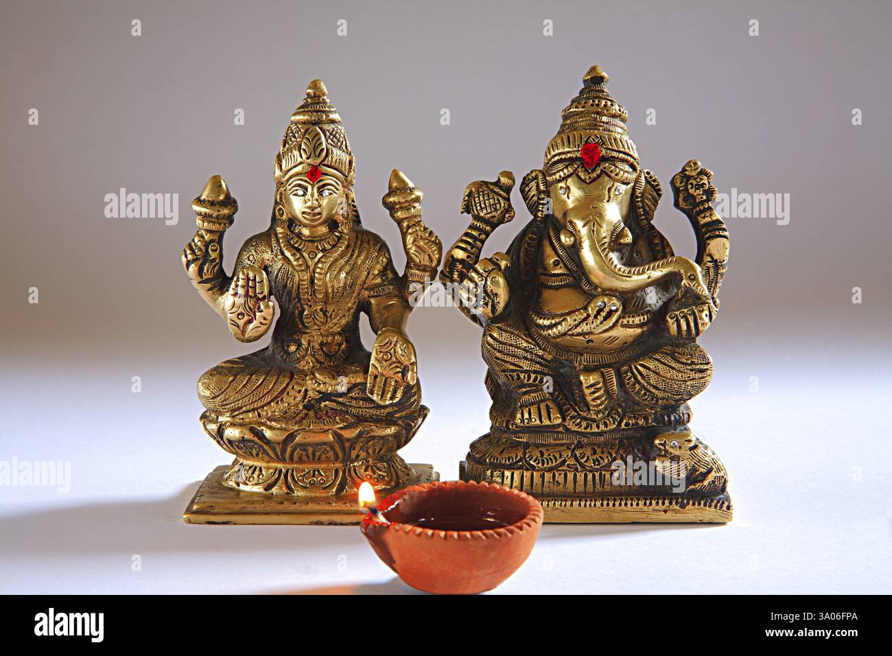 Diwali deepawali festival, shree lakshmi puja with god ganesh, oil lamp ...
