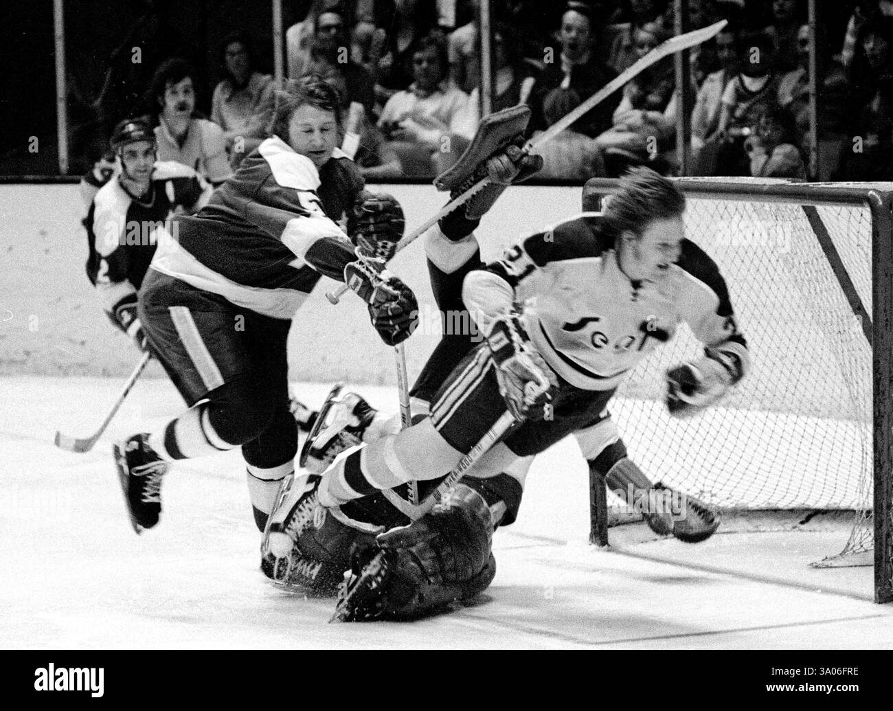 Minnesota North Stars Dennis O'Brien (5) shoving California Golden ...