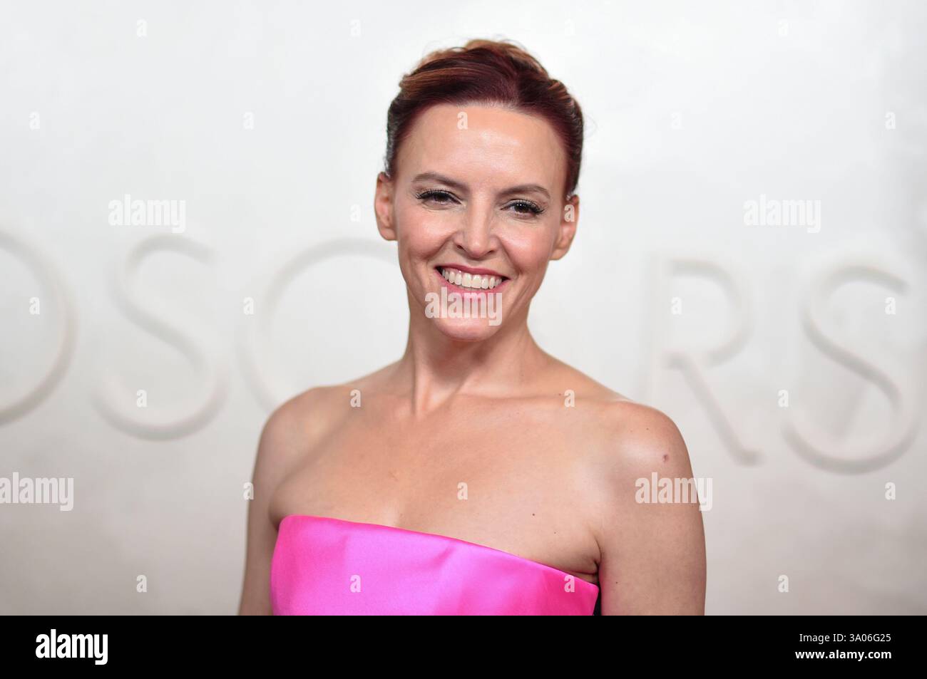 Andrea Datzman arrives at the Oscars on Sunday, March 2, 2025, at the ...