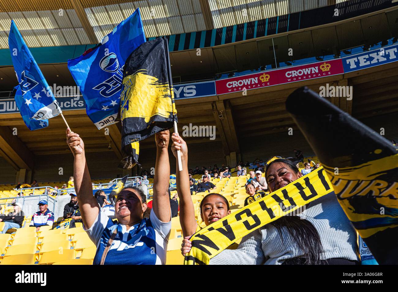 Wellington, New Zealand, 1 March, 2025. Hurricanes and Blues fans pose ...