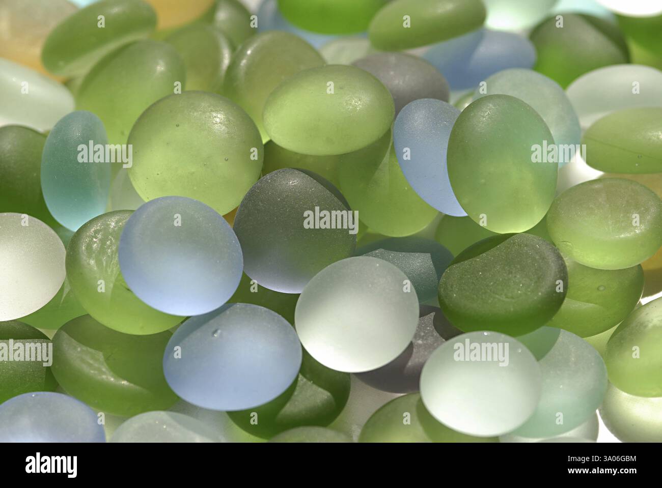 Colored glass marbles round stones Stock Photo - Alamy