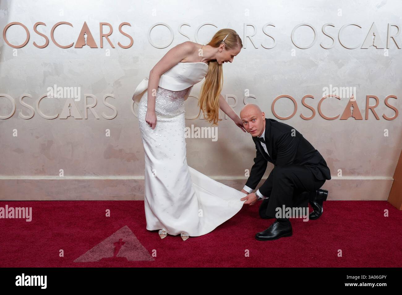 Anna Shevchuk, left, is helped by Yura Borisov as they arrive at the ...