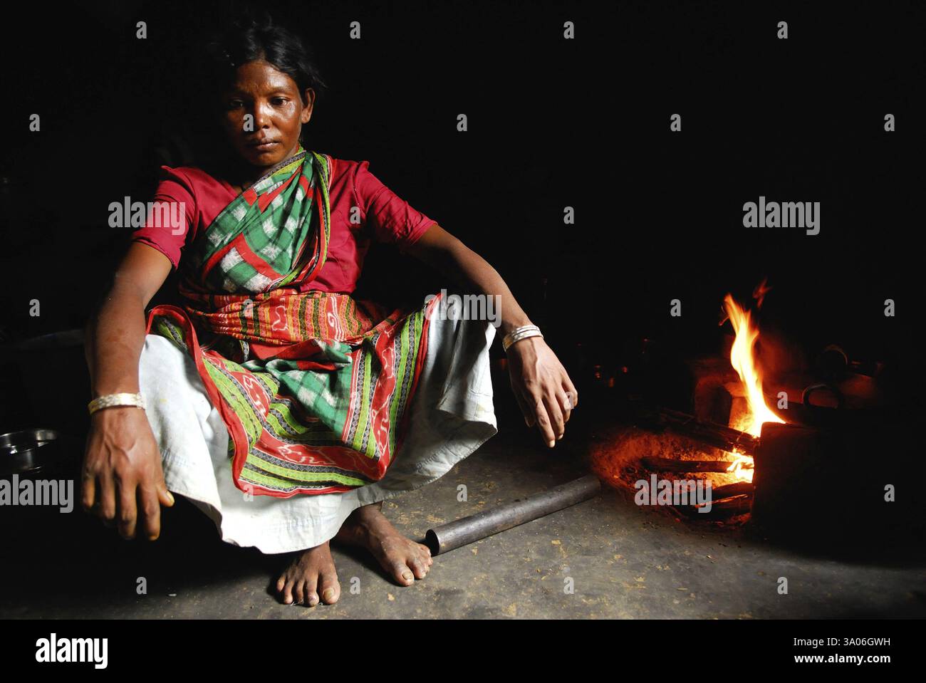 Ho tribes woman cooking with wood coal, Chakradharpur, Jharkhand, India ...