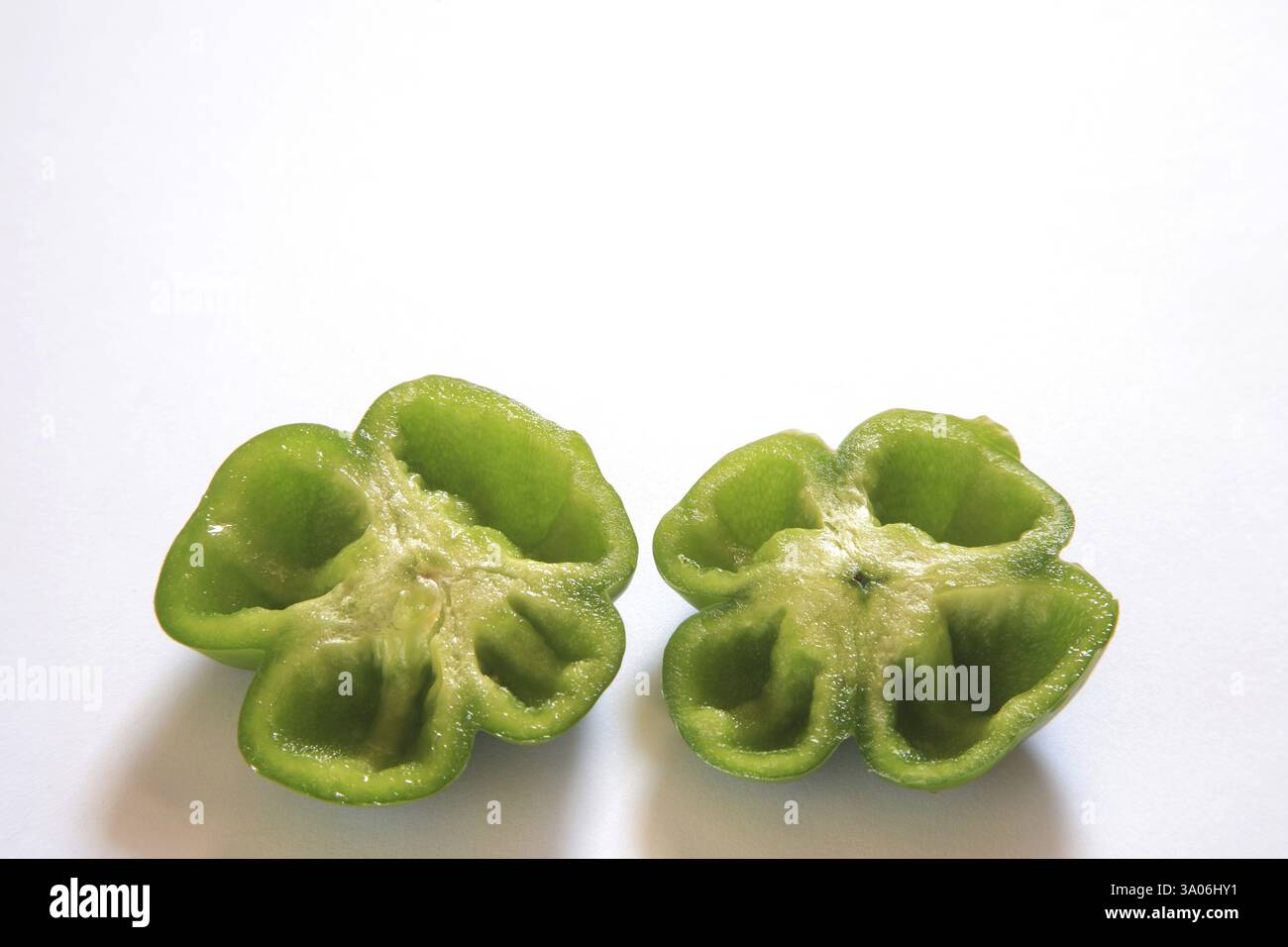 Spices, half cut green chillies capsicum shimla mirch capsicum annuum ...
