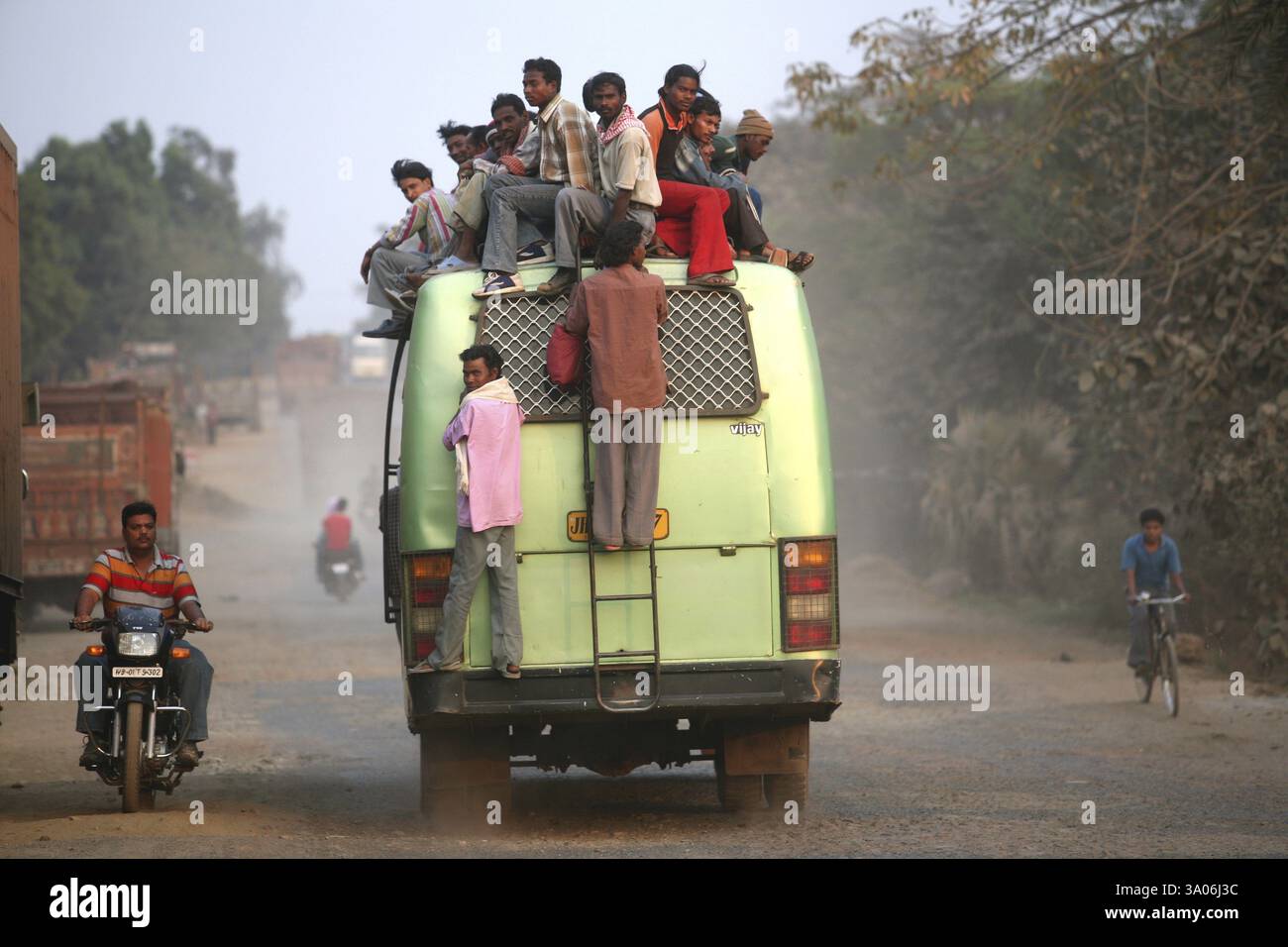Passengers sitting on top of bus used local transport system in ...