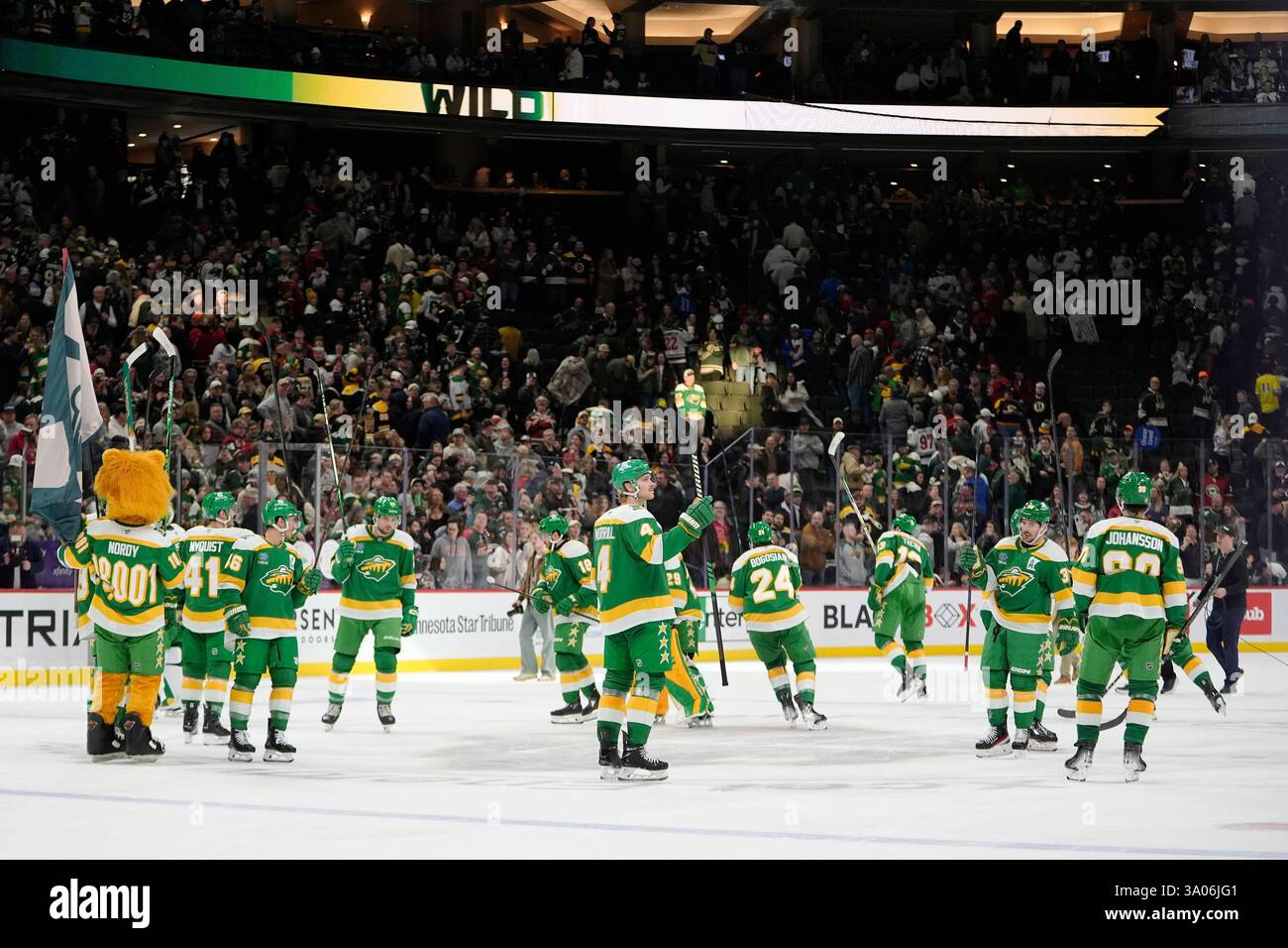 Minnesota Wild players celebrate after a win against the Boston Bruins ...