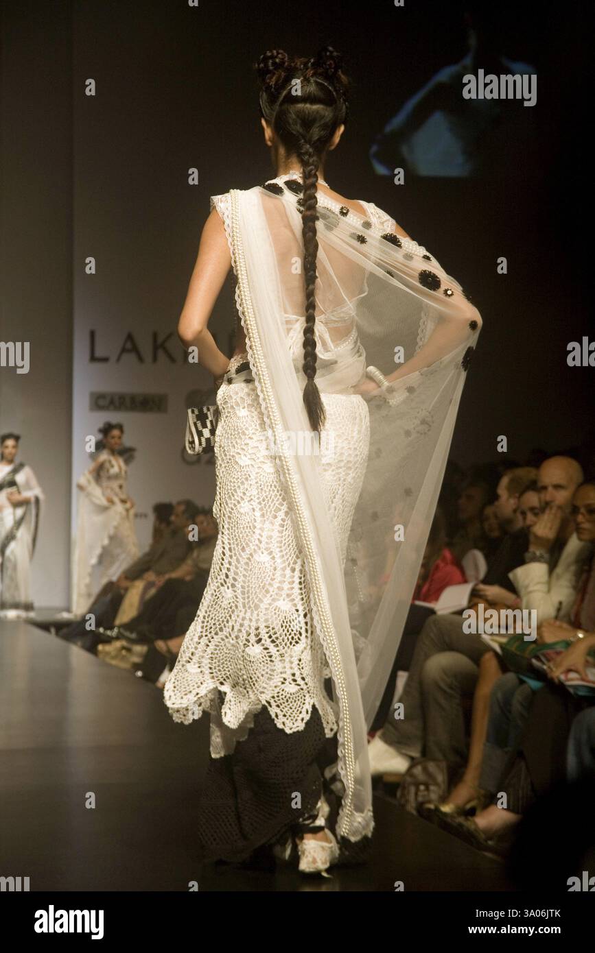 Modeling, Indian female model walking on ramp in designer clothes ...
