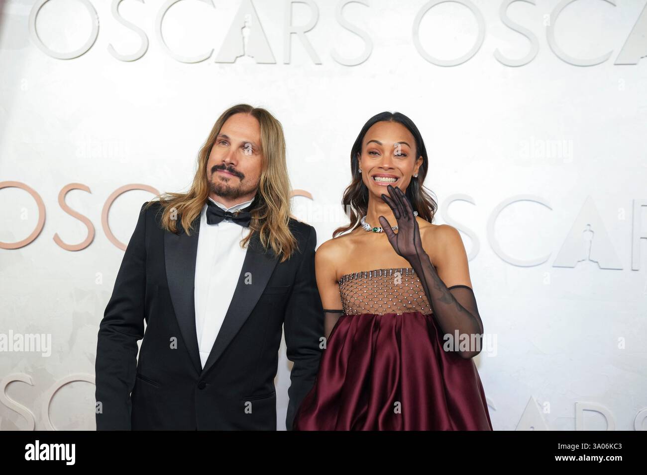 Marco Perego-Saldana, left, and Zoe Saldana arrive at the Oscars on ...