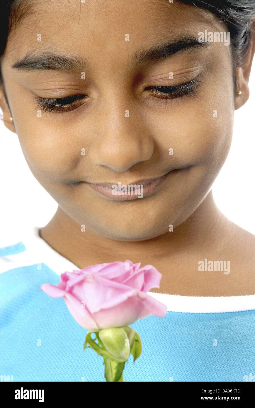 Girl holding pink rose, Bombay Mumbai, Maharashtra, India MR#152 Stock ...