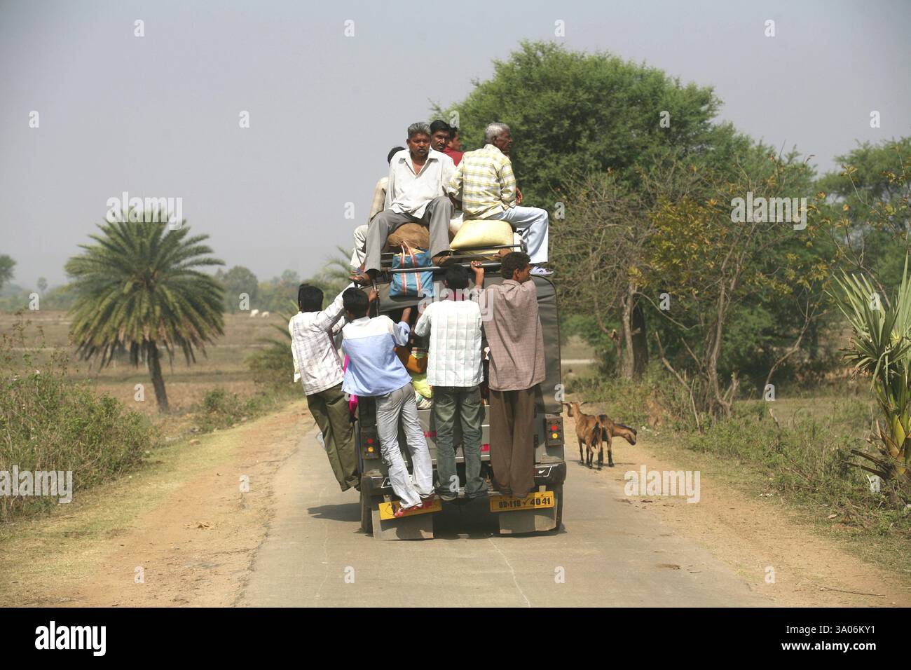 Passengers sitting on top of jeep used as local transport system in ...