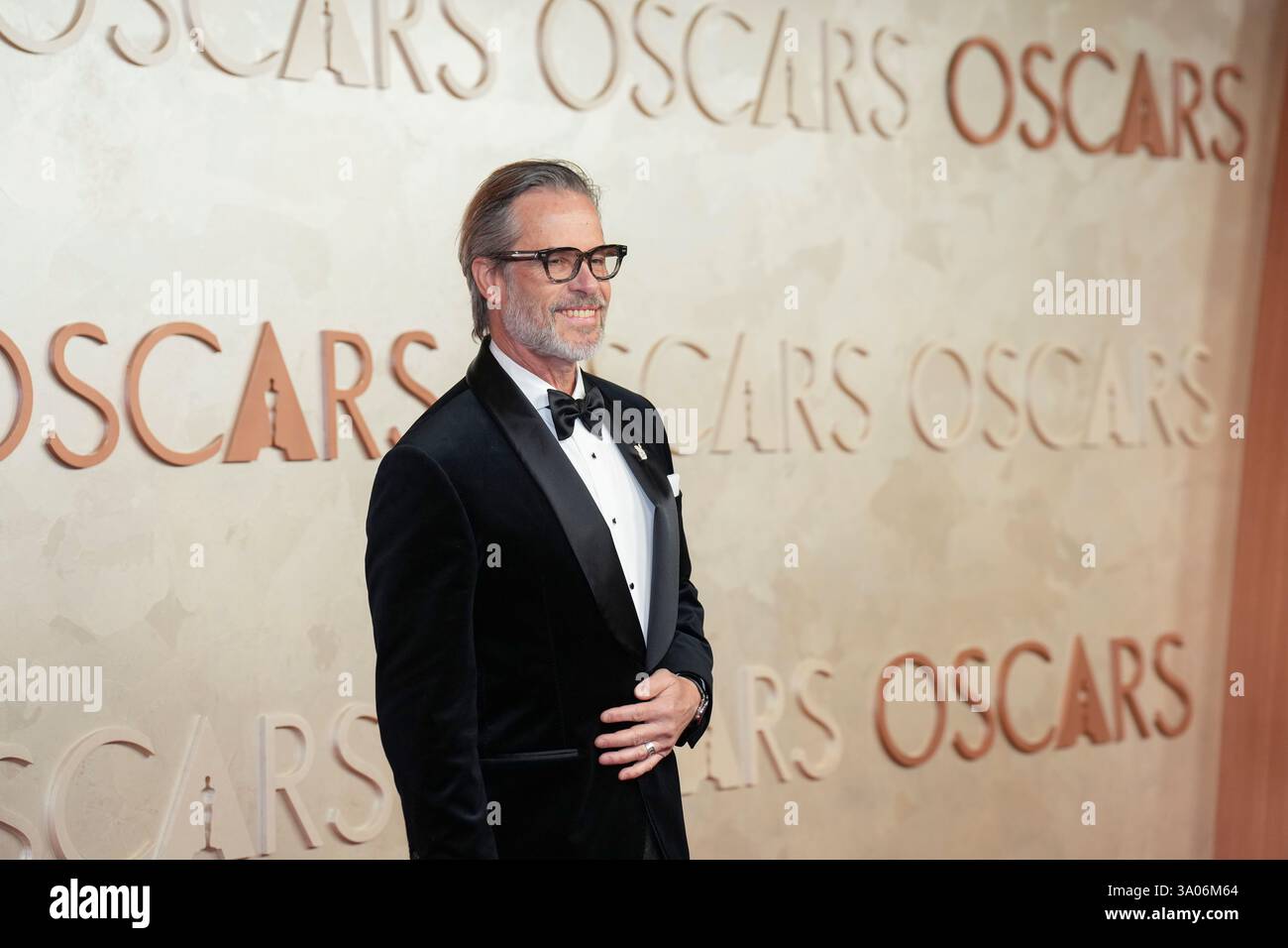 Guy Pearce arrives at the Oscars on Sunday, March 2, 2025, at the Dolby ...