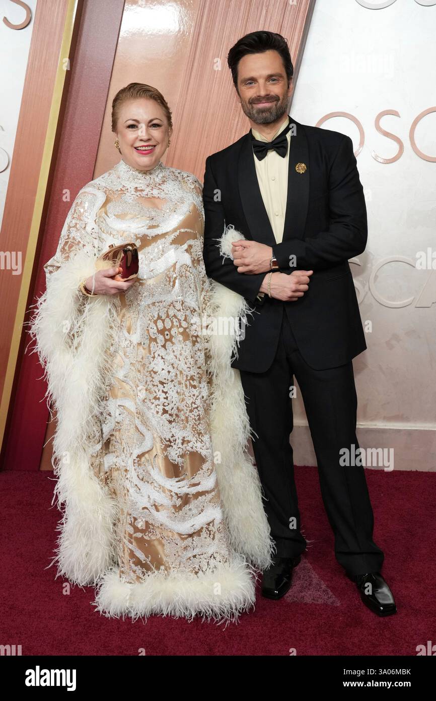 Georgeta Orlovschi, left, and Sebastian Stan arrive at the Oscars on ...