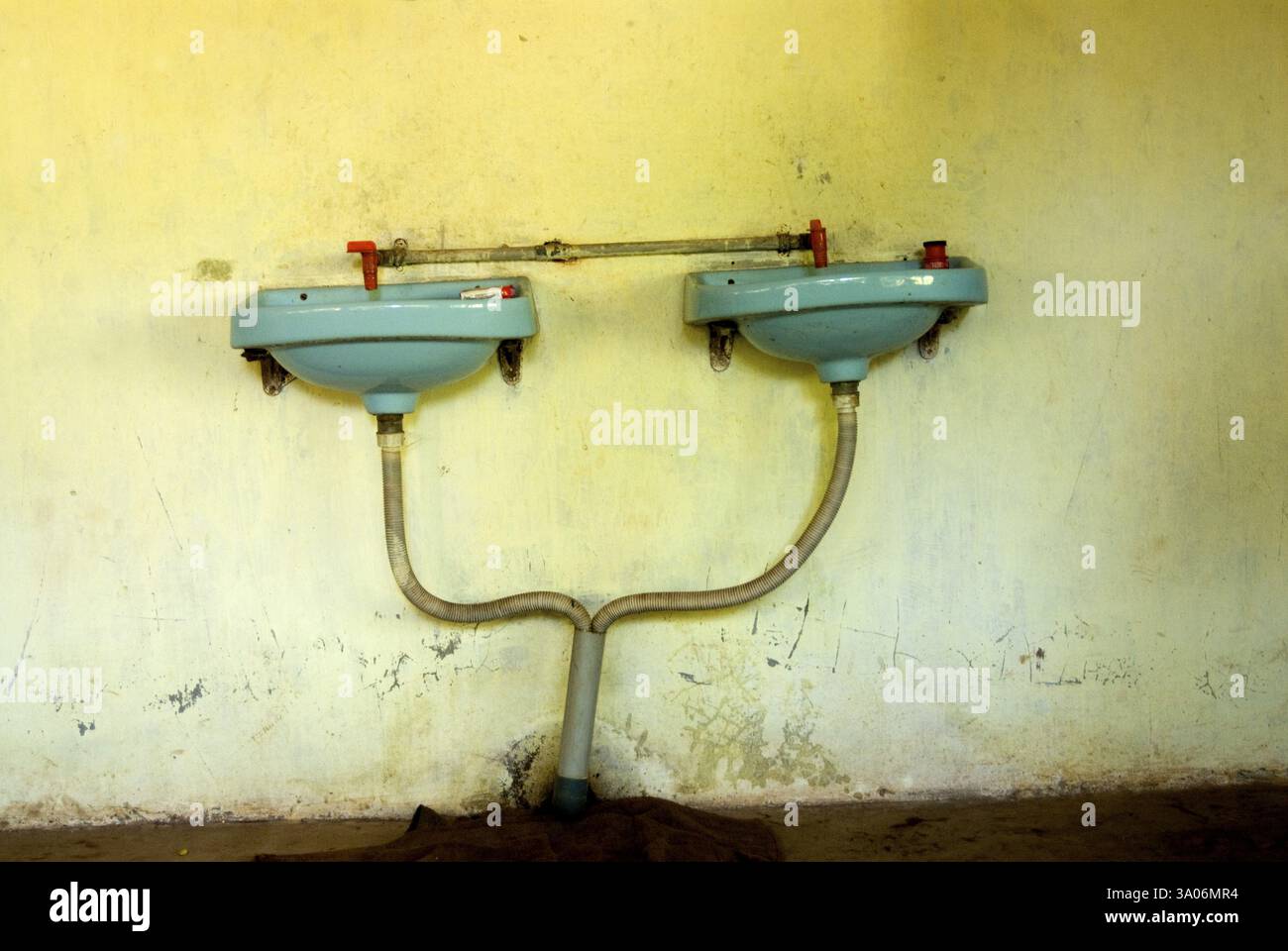 Two washbasin and two red taps, Anjarle village at district Dapoli ...