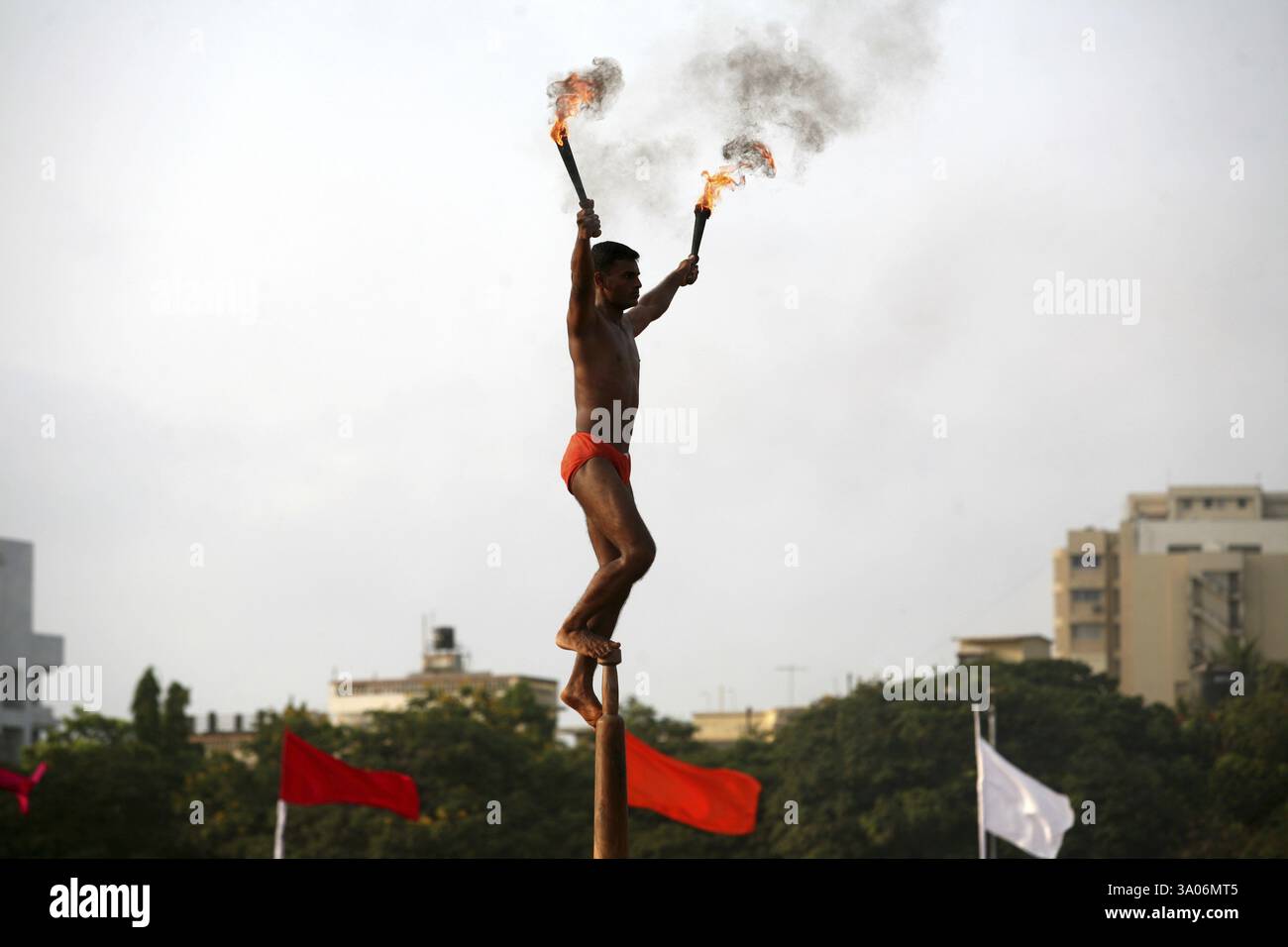 Police men performing Malkhamb Indian gymnastics on 1 May Maharashtra ...