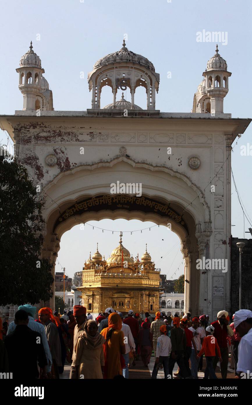 Devotees at entrance gate near Ath-sath Tirath to Harmandir Sahib or ...