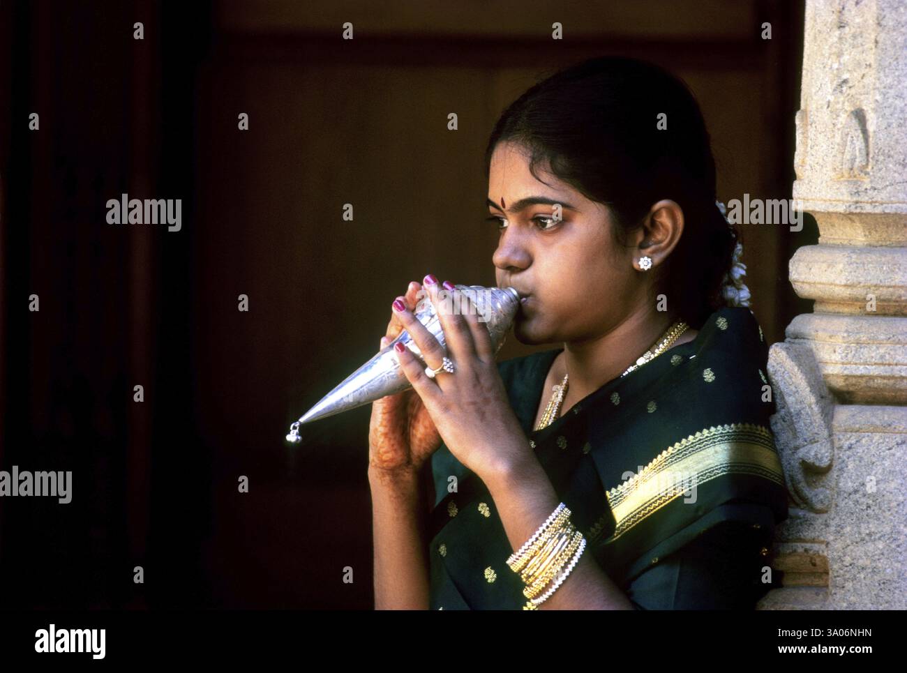 Conch blow Tamil nadu INDIA Model release 777A Stock Photo - Alamy