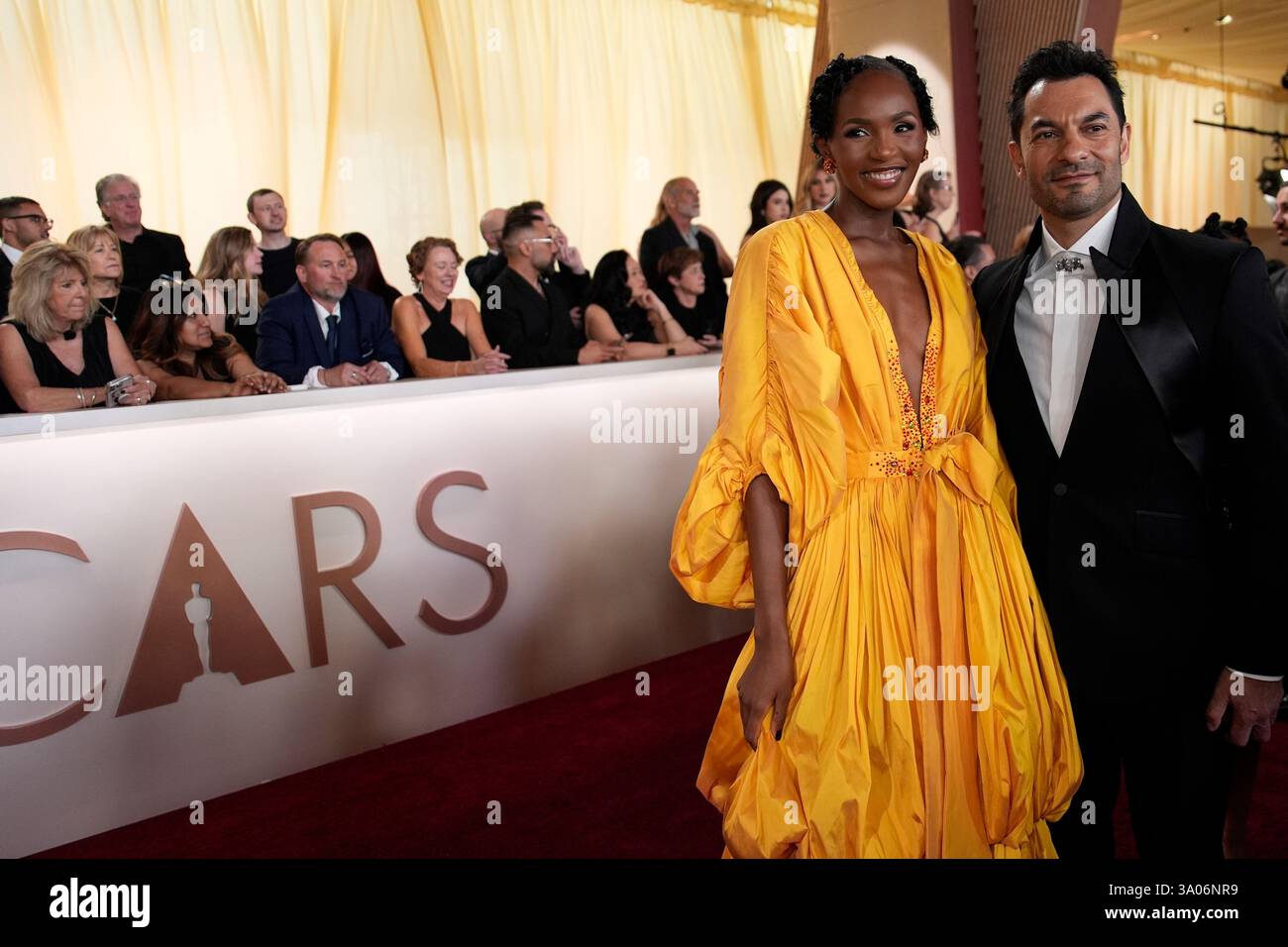 Avumile Qongqo, left, and Darwin Shaw arrive at the Oscars on Sunday ...