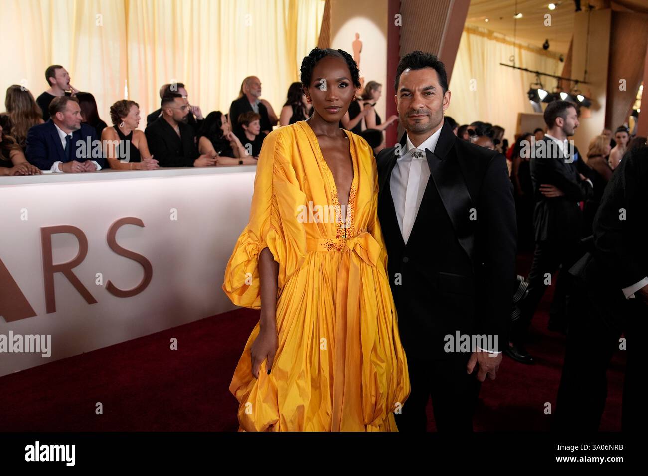 Avumile Qongqo, left, and Darwin Shaw arrive at the Oscars on Sunday ...