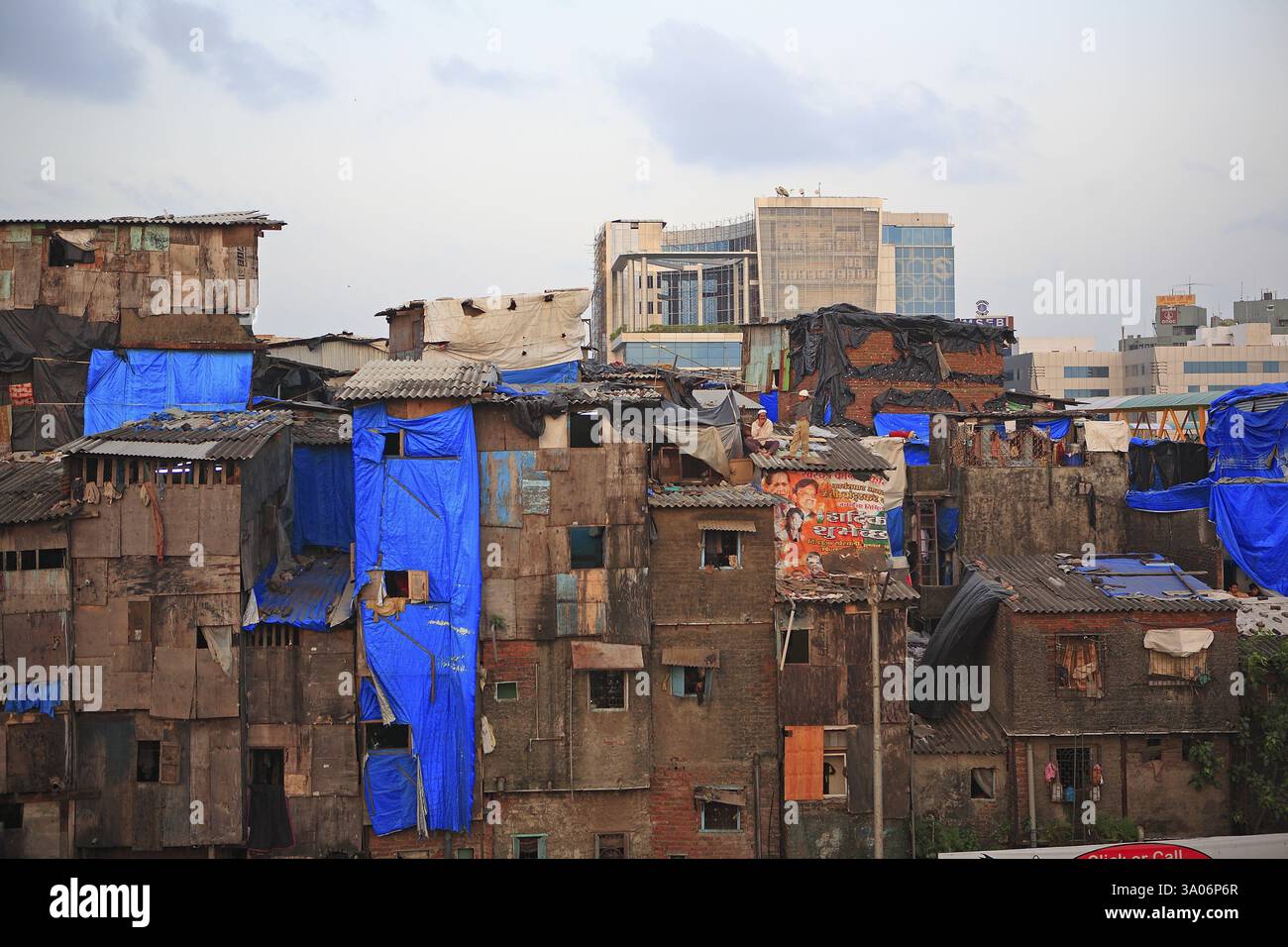 Slums and modern buildings at Behrampada, Bandra, Bombay Mumbai ...