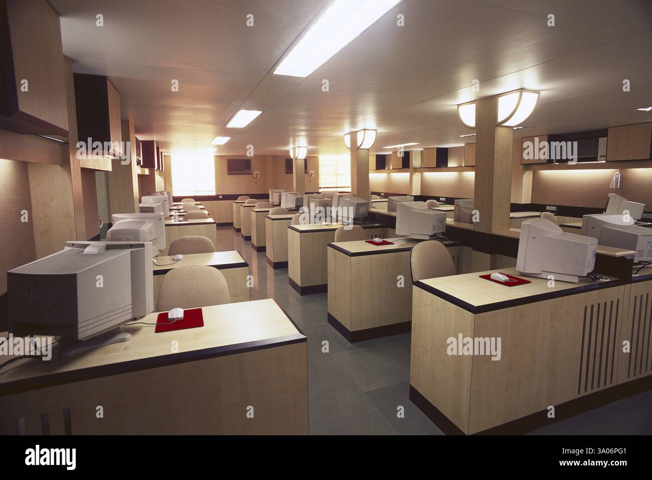Interior of office with computers in computer class Stock Photo - Alamy