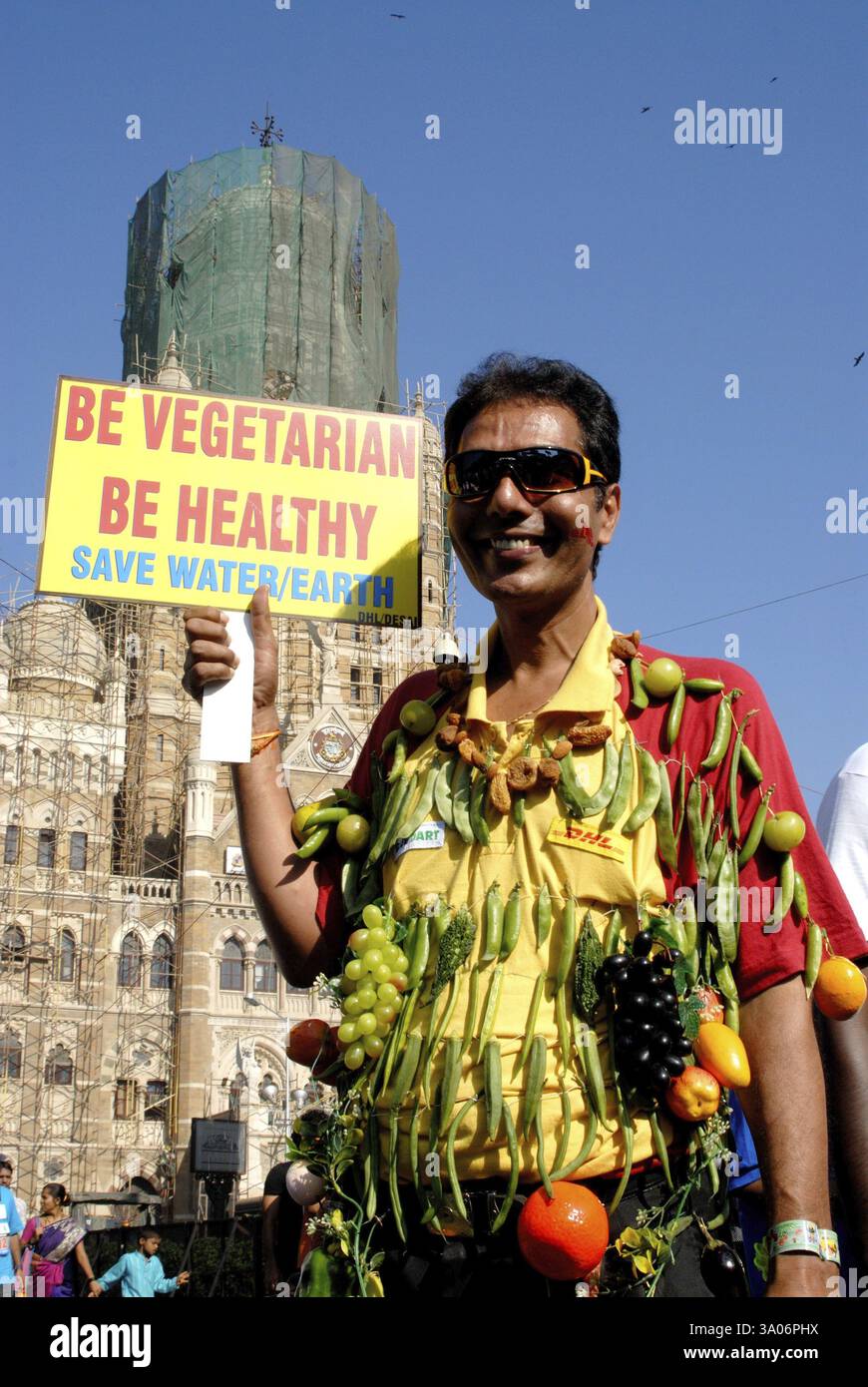 Man with green vegetable Fruits giving Message Mumbai Maharashtra India ...