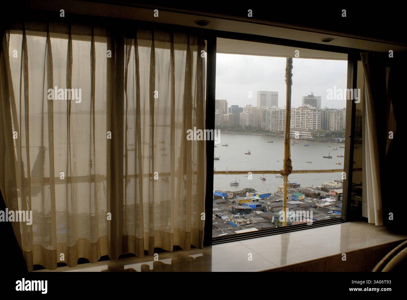 Bombay skyline through window at cuff parade, Bombay Mumbai ...