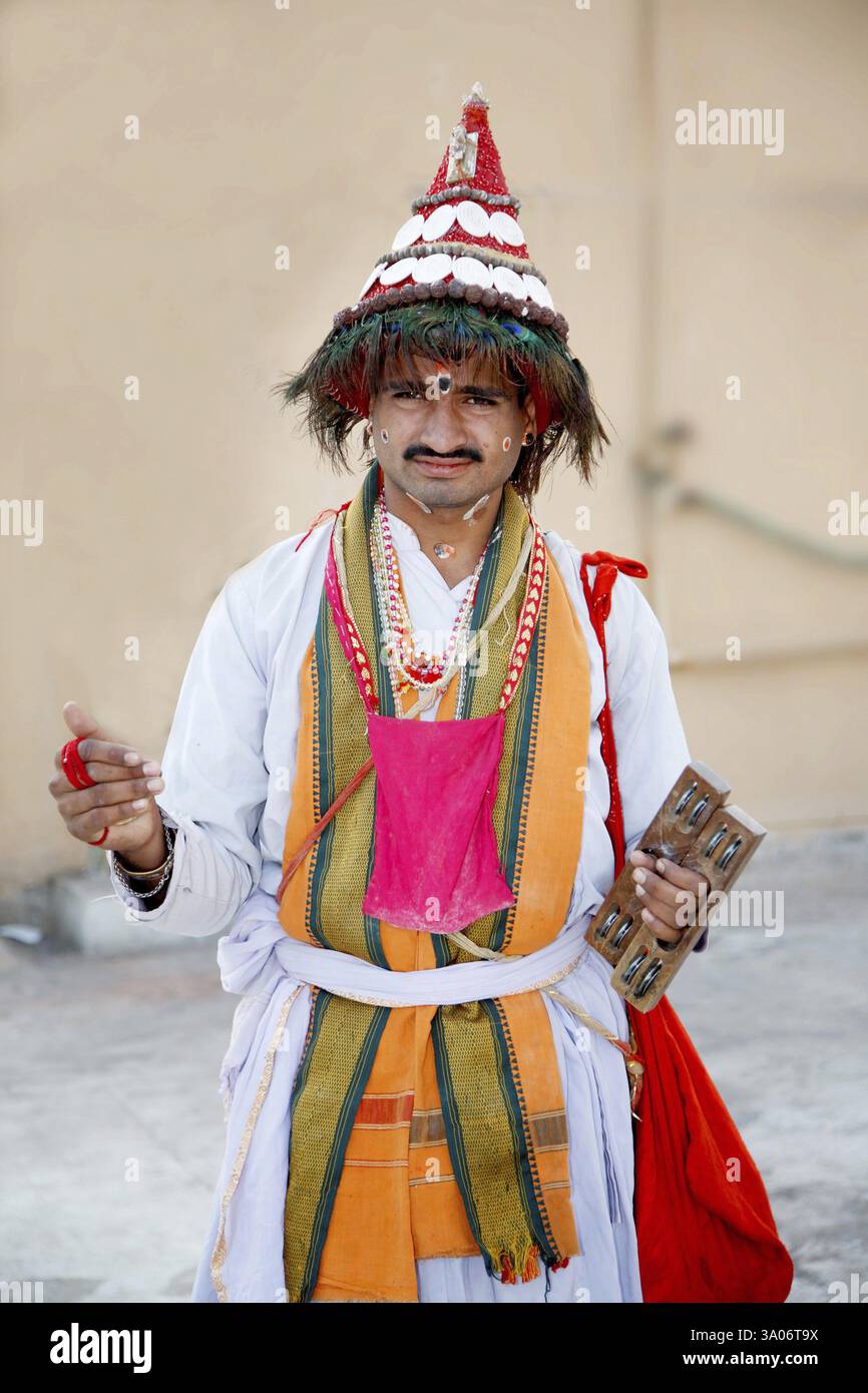 Vasudev in headgear of peacock feather holding chiplya or kartals MR ...