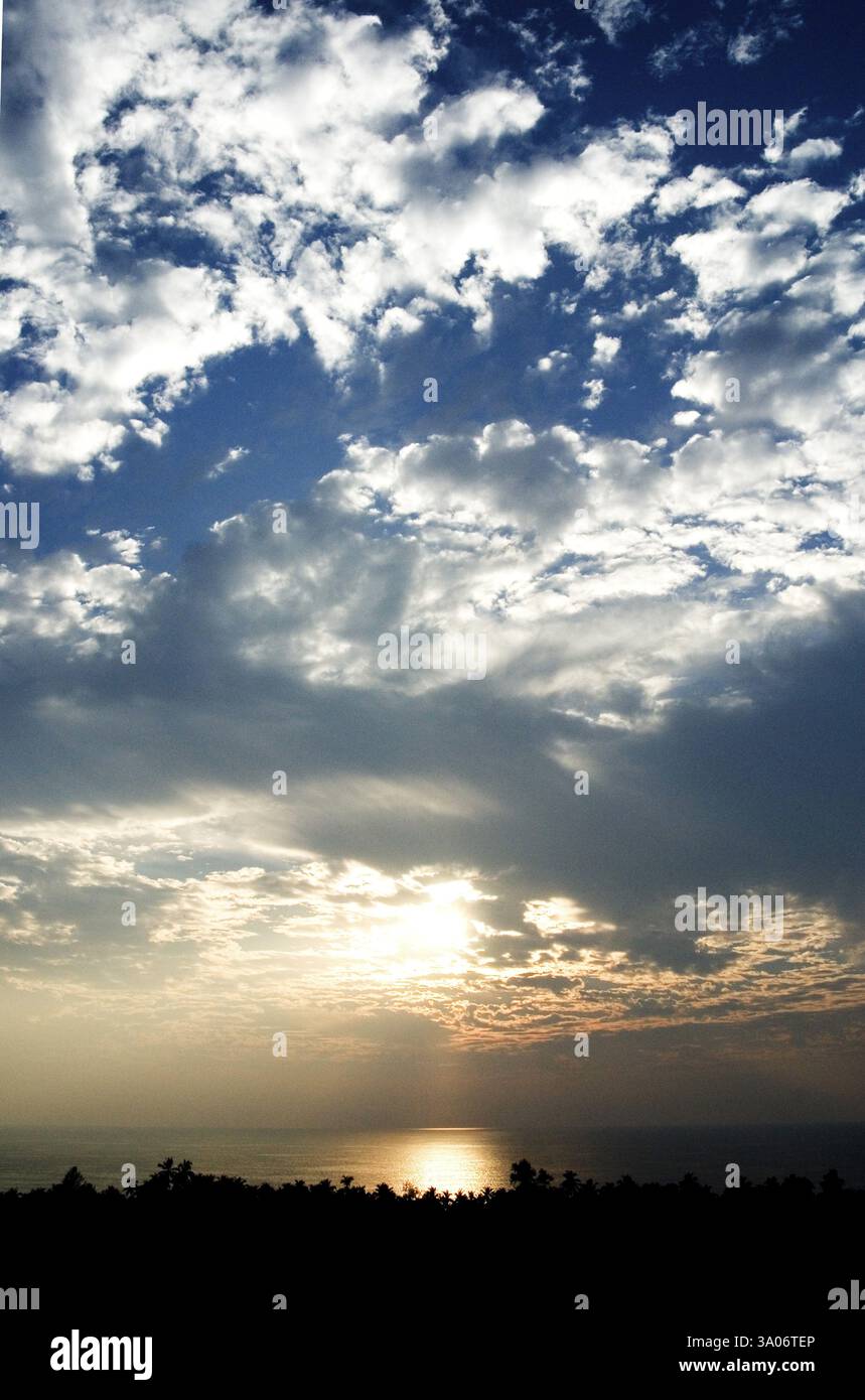 Sunset on Arabian sea and beautiful sky with clouds at Anjarle beach ...