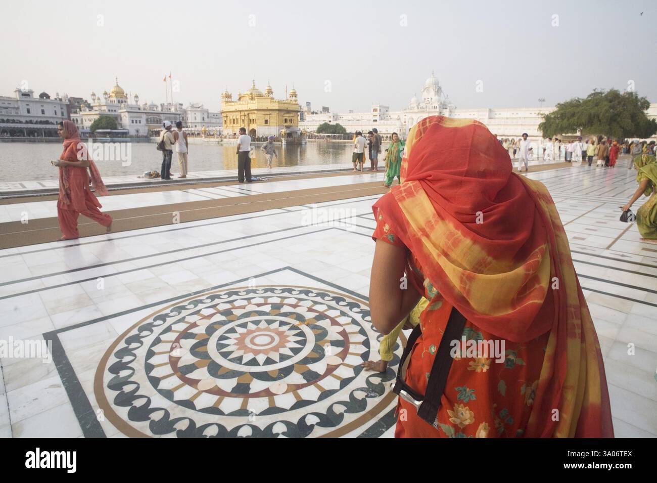 Sikh Devotee bowing down Hari Mandir Sahib and praying, Marble pattern ...
