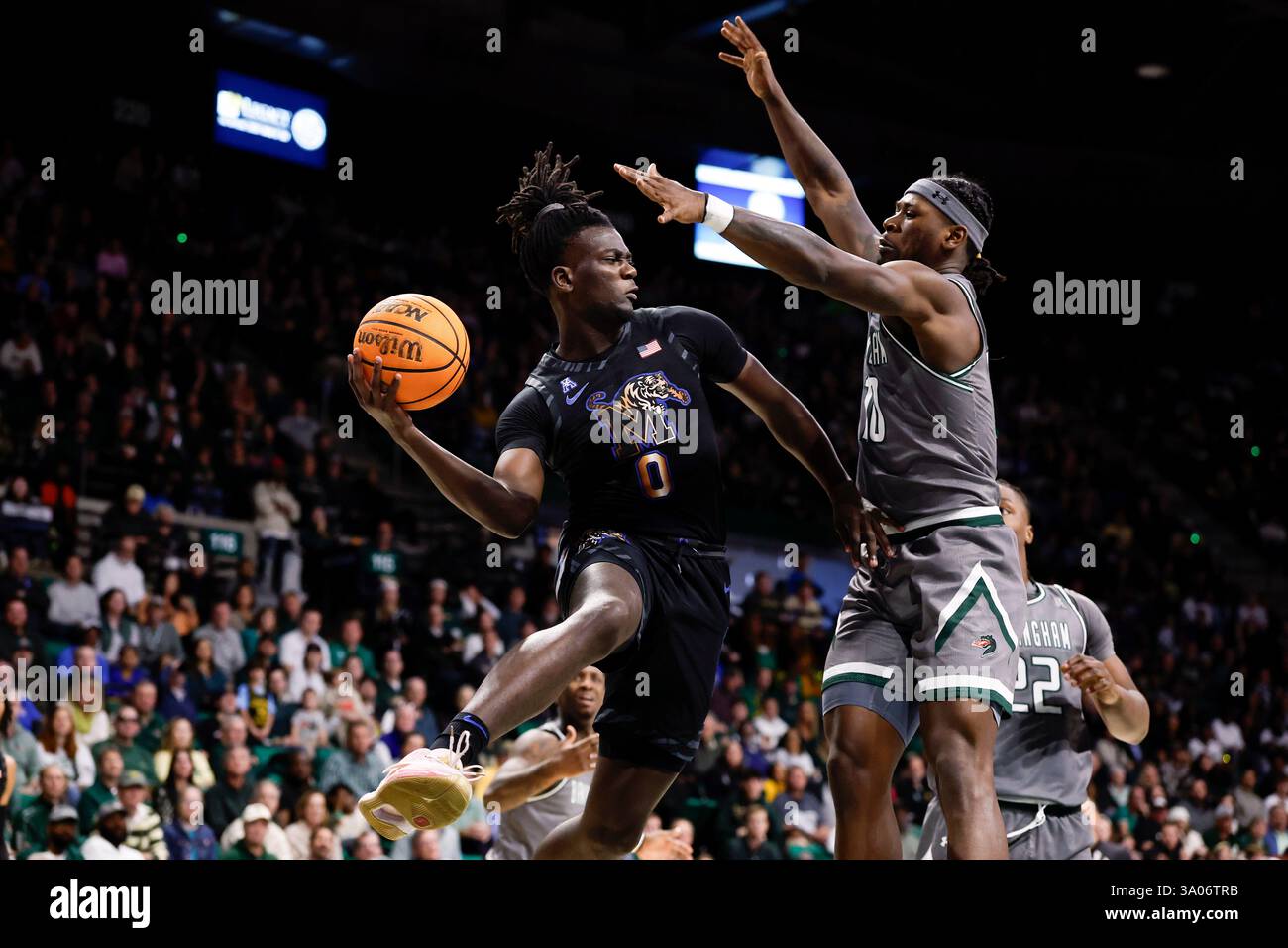Memphis forward Damarien Yates (0) tries to pass the ball as UAB guard ...