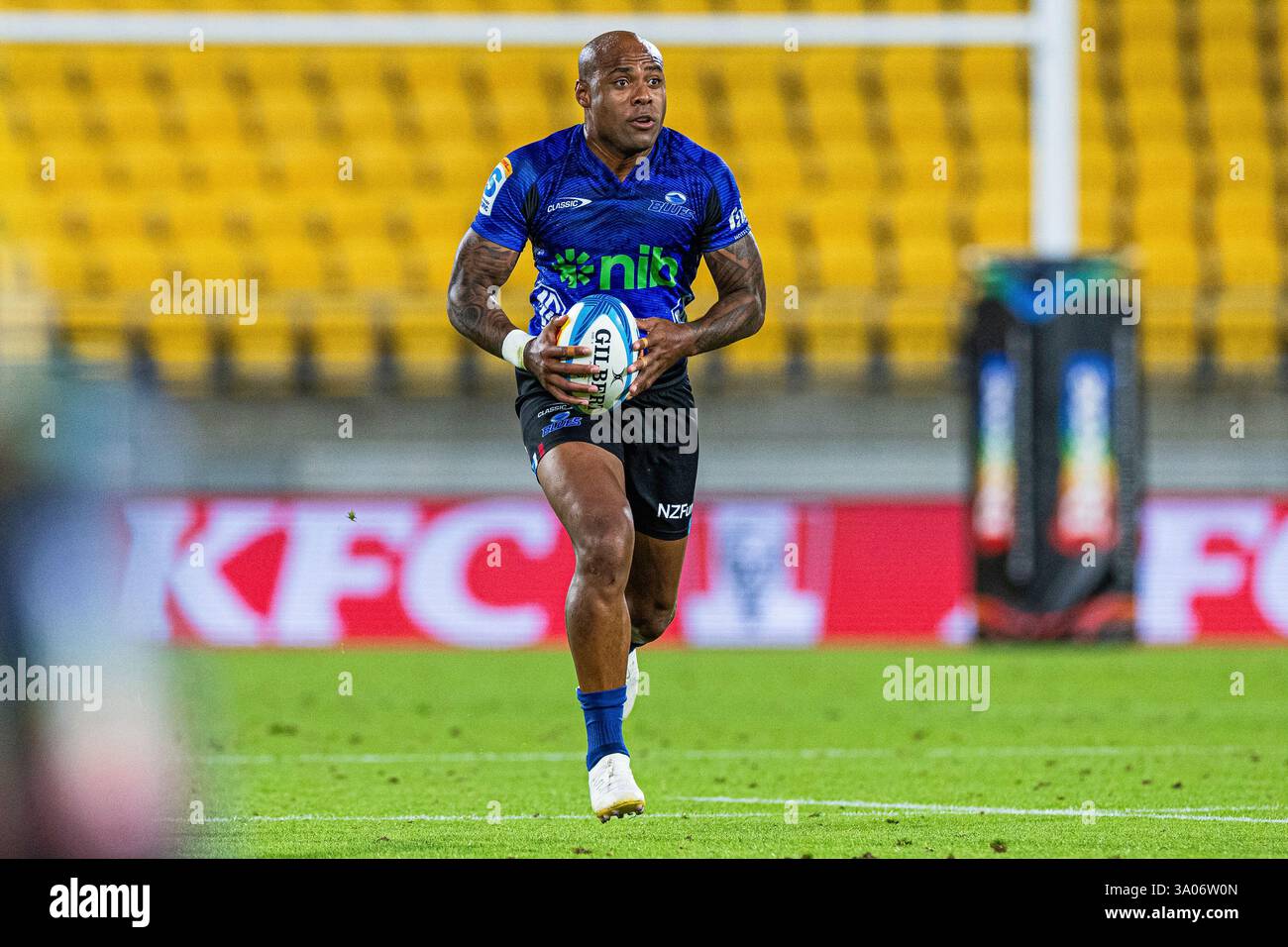 WELLINGTON, NEW ZEALAND - March 01: Blues right winger attempts to race ...
