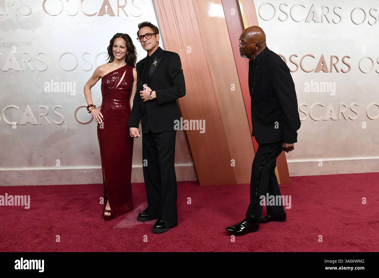 Susan Downey, left, Robert Downey Jr. and Samuel L. Jackson arrive at ...