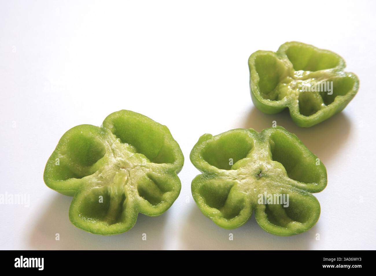 Spices, half cut green chillies capsicum shimla mirch capsicum annuum ...