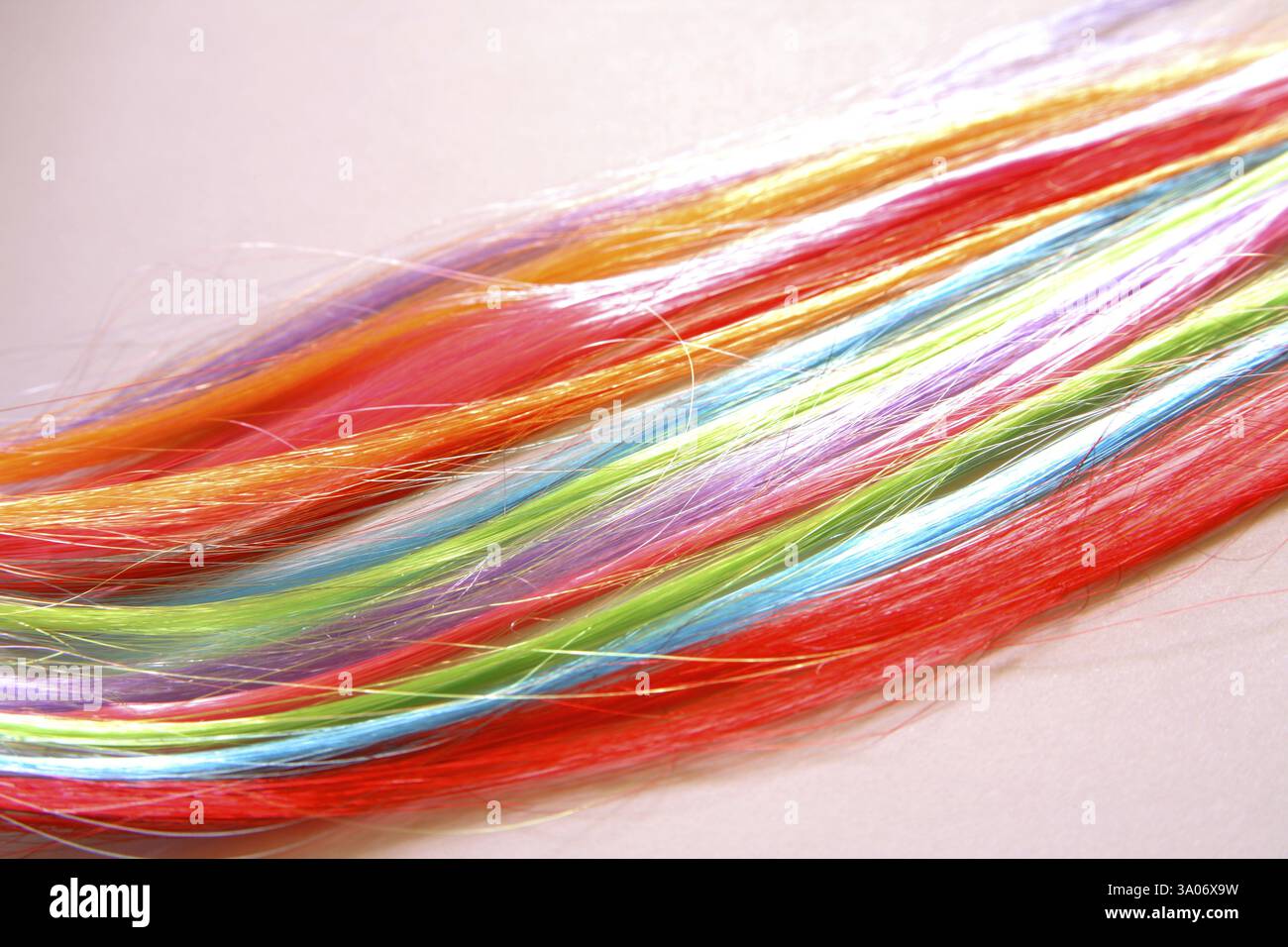 Artificial colourful hair made from soft plastic Stock Photo - Alamy