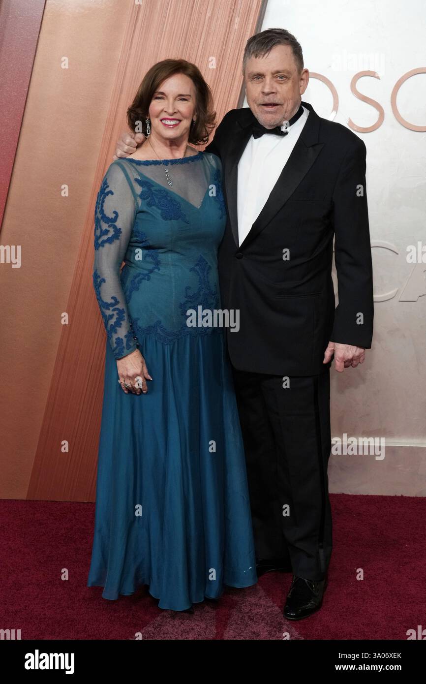 Marilou York, left, and Mark Hamill arrive at the Oscars on Sunday ...