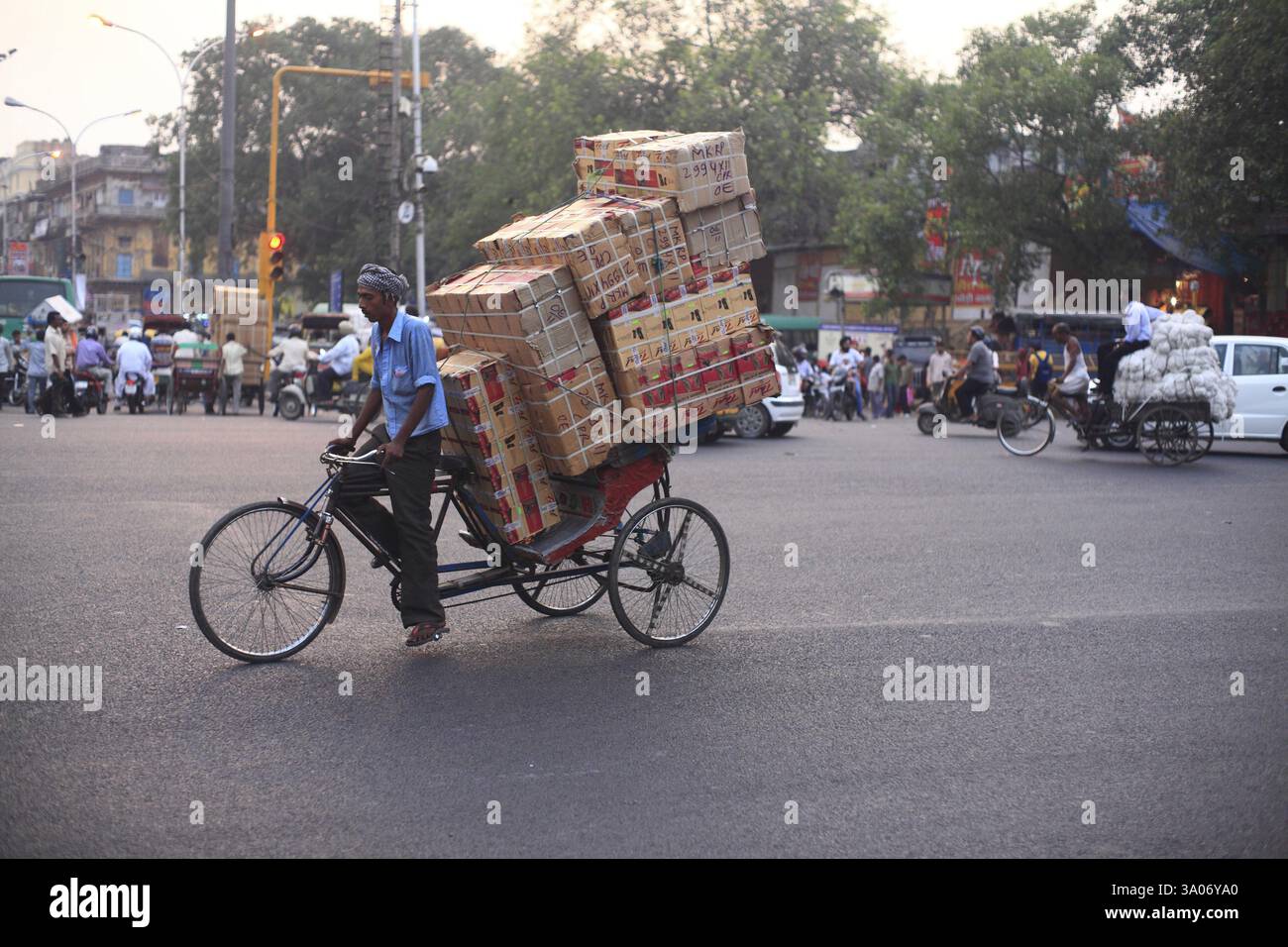 Rickshaw Workers Pull hand cart loaded with goods at Delhi Stock Photo ...